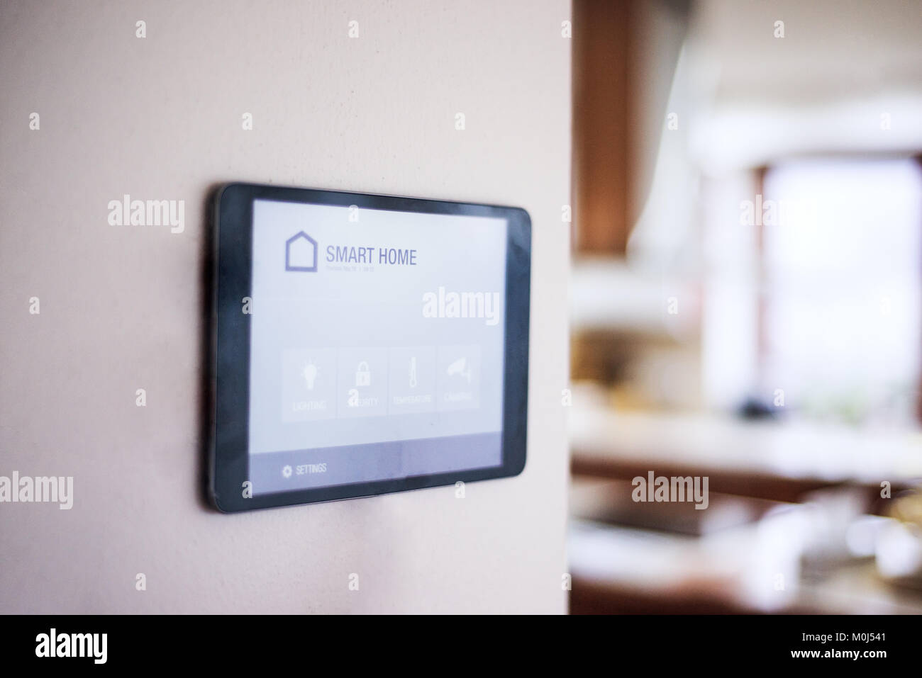A tablet with smart home screen Stock Photo - Alamy