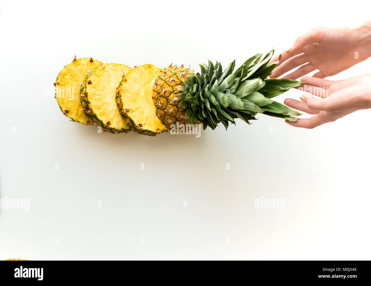 hands with sliced fresh pineapple Stock Photo - Alamy hands with sliced fresh pineapple Stock Photo - Alamy