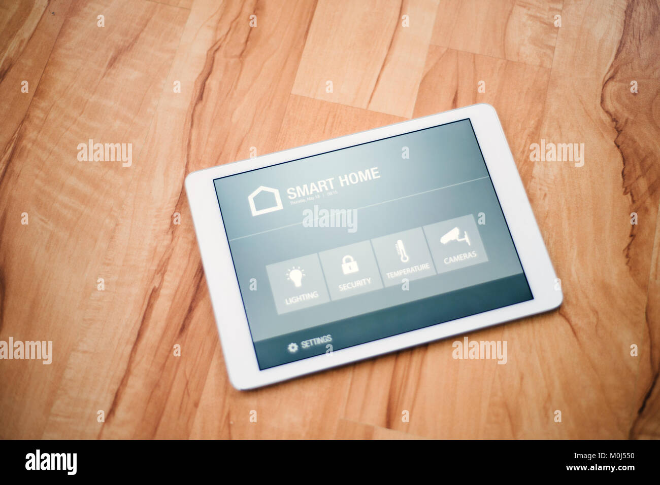A tablet with smart home screen Stock Photo - Alamy