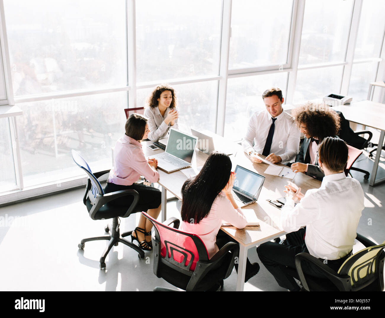 Business consultants working in a team Stock Photo - Alamy