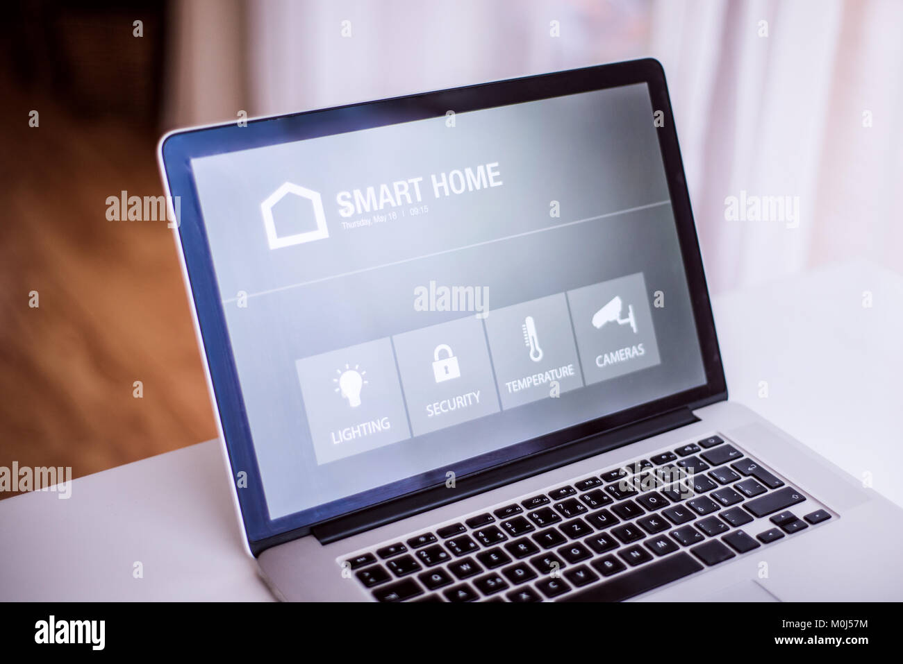 A laptop with smart home screen Stock Photo - Alamy