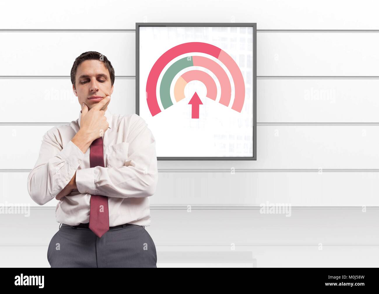 Businessman thinking with colorful chart statistics on board on wall ...