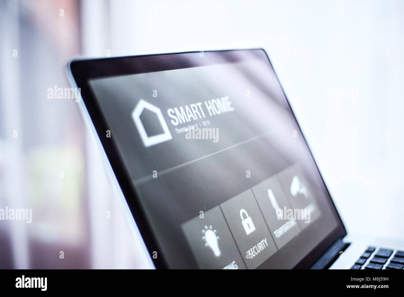 A laptop with smart home screen Stock Photo - Alamy