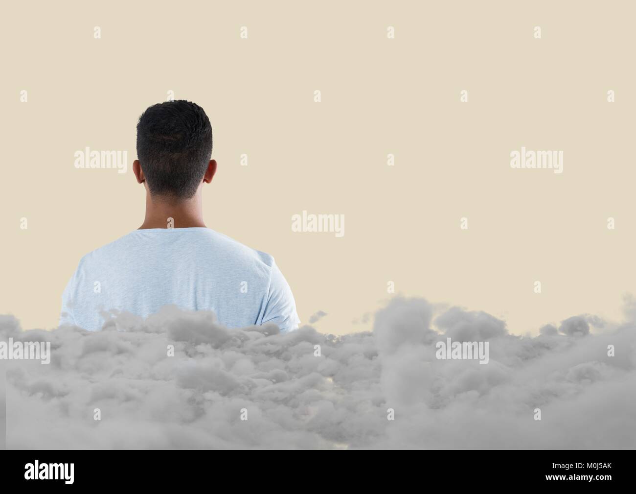 Teenager looking forward with clouds behind him Stock Photo - Alamy