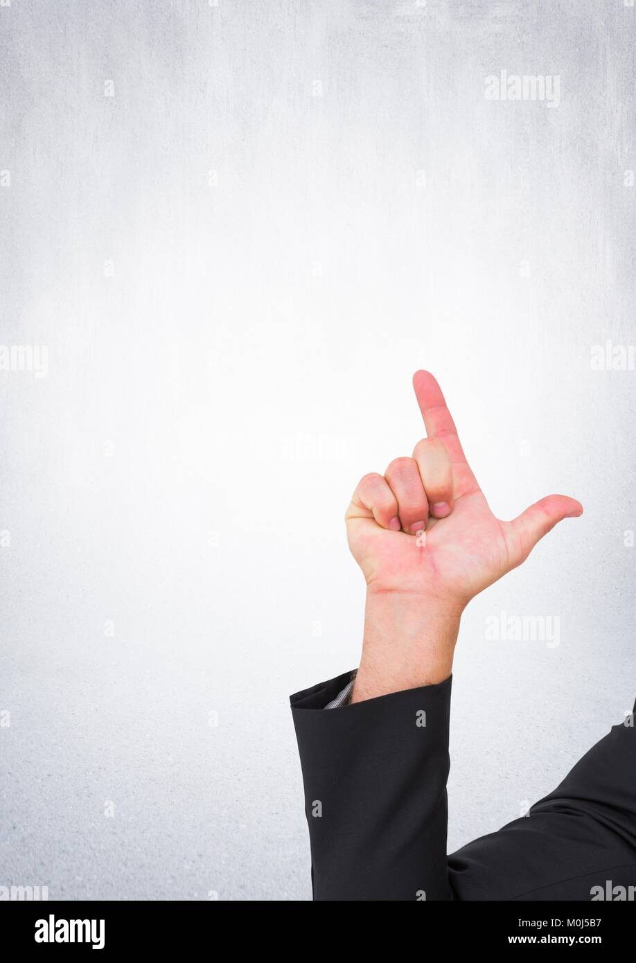 Hand pointing with bright background Stock Photo - Alamy