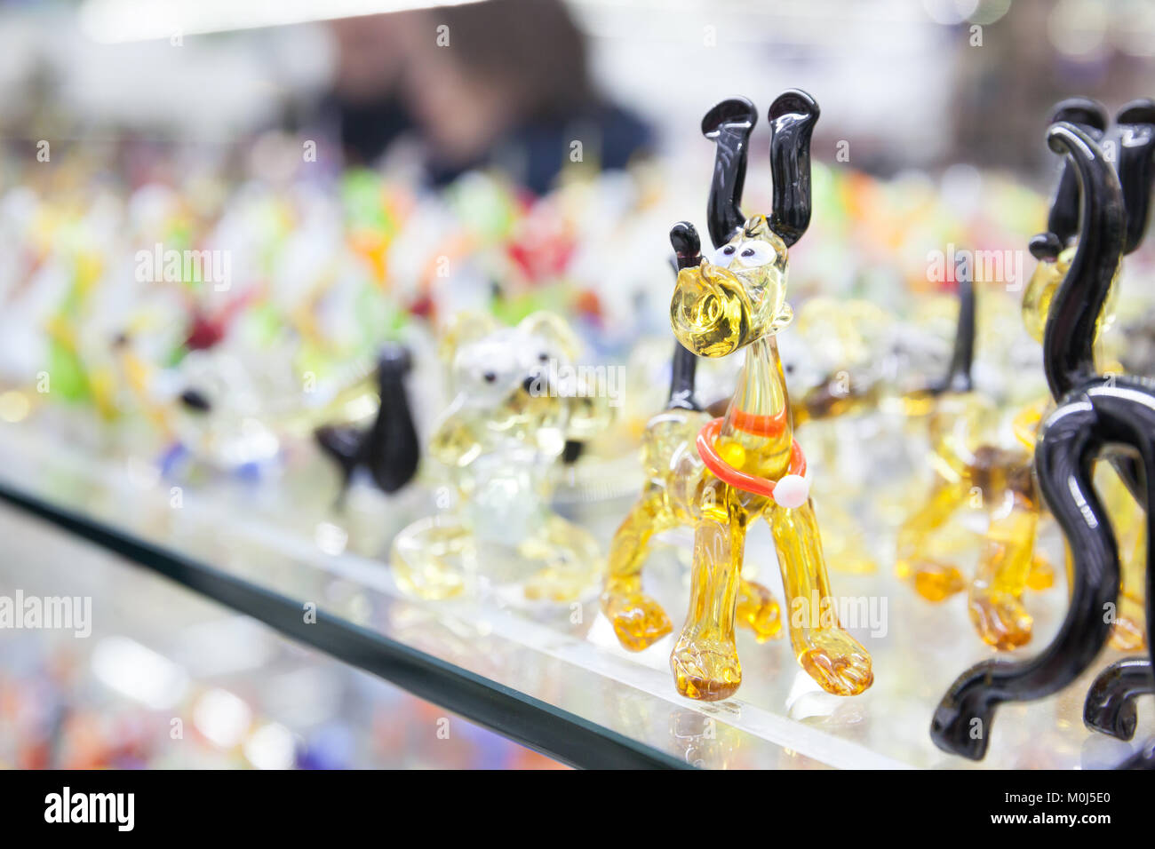 Close up of a delicate souvenir made in glass, a traditional craft in ...