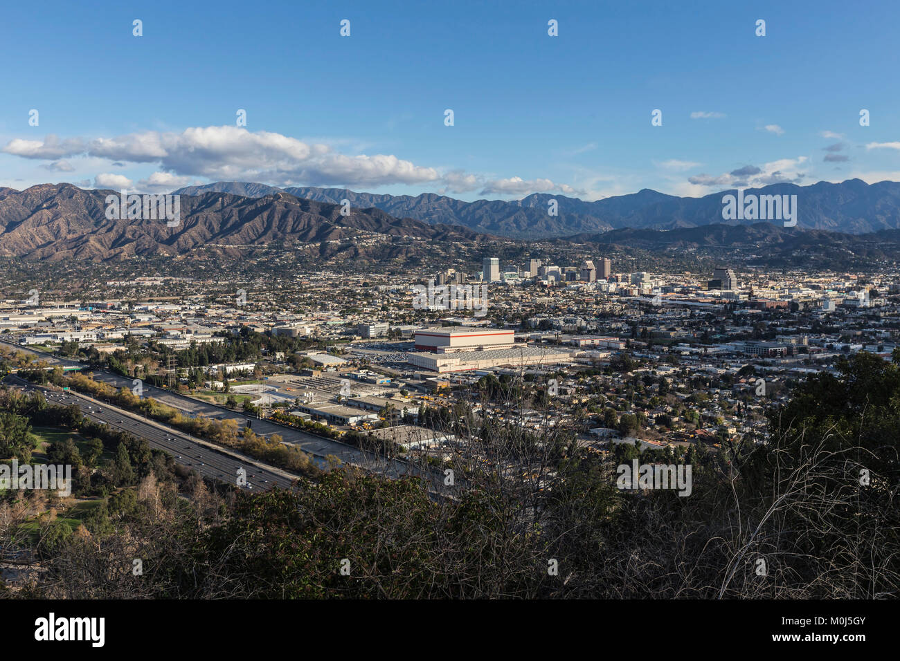 Hilltop view of downtown Glendale and the San Gabriel Mountains in Los ...