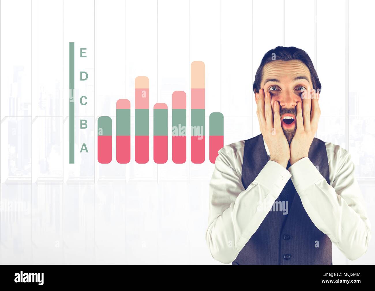 Man surprised with colorful chart statistics Stock Photo - Alamy