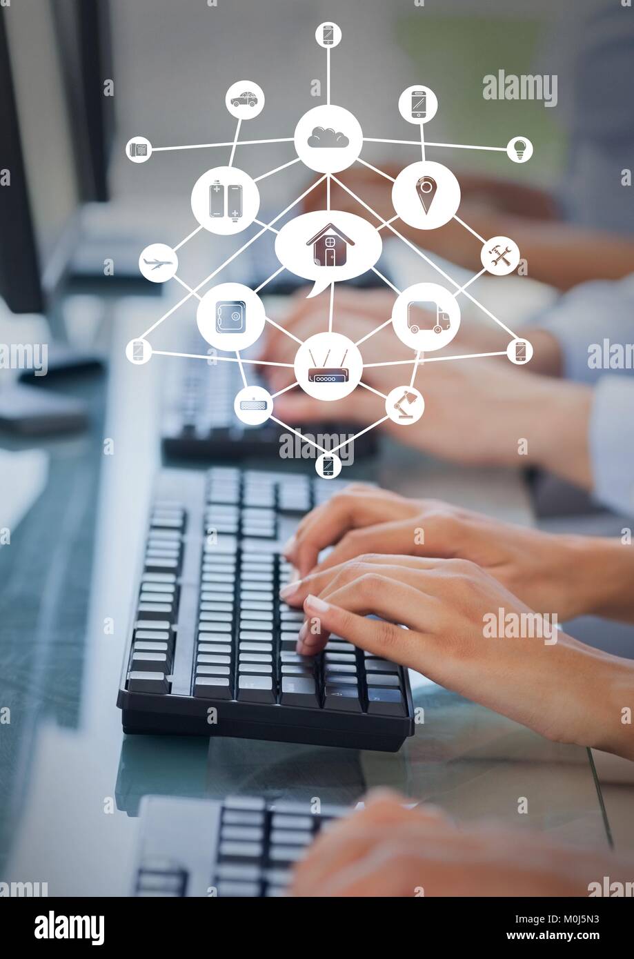 Hands wrinting on computer with graph overlays Stock Photo - Alamy