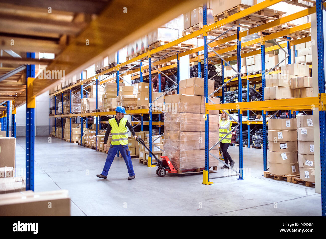 Pulling pallet truck hi-res stock photography and images - Alamy