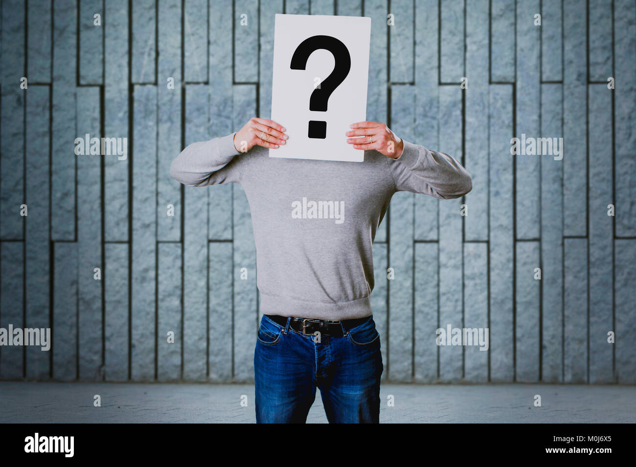 Man with question symbol on his face Stock Photo - Alamy