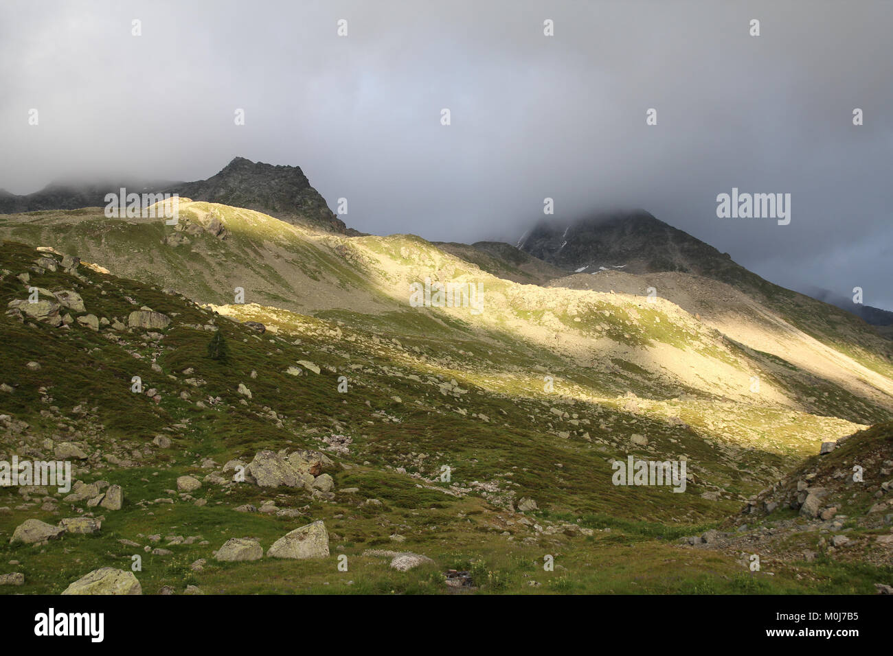 Sunlight on Swiss Alps in canton Grisons (Graubunden), Switzerland ...
