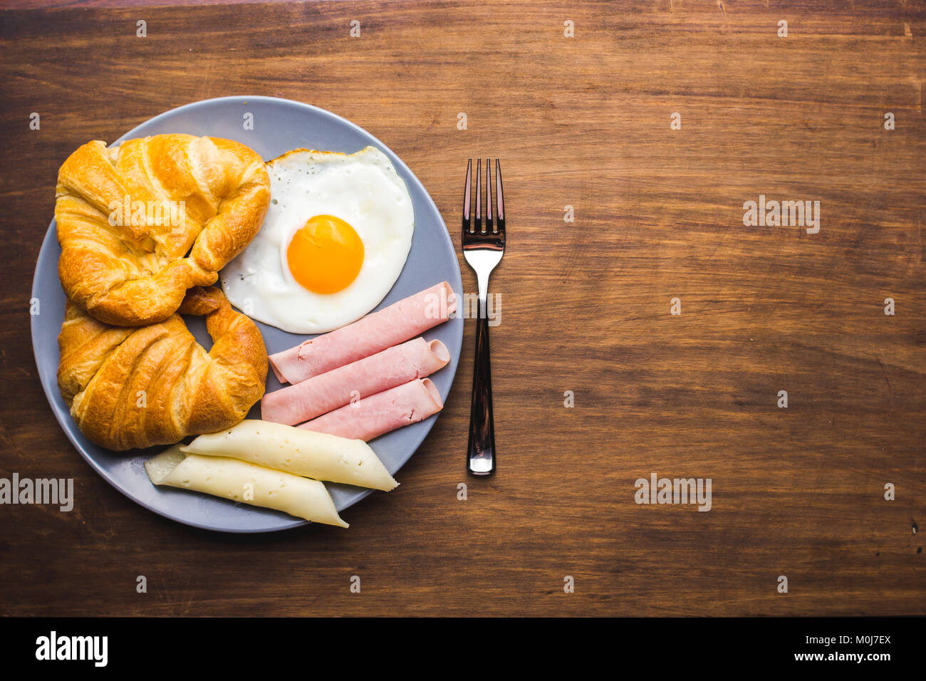 Traditional breakfast on wood background Stock Photo - Alamy