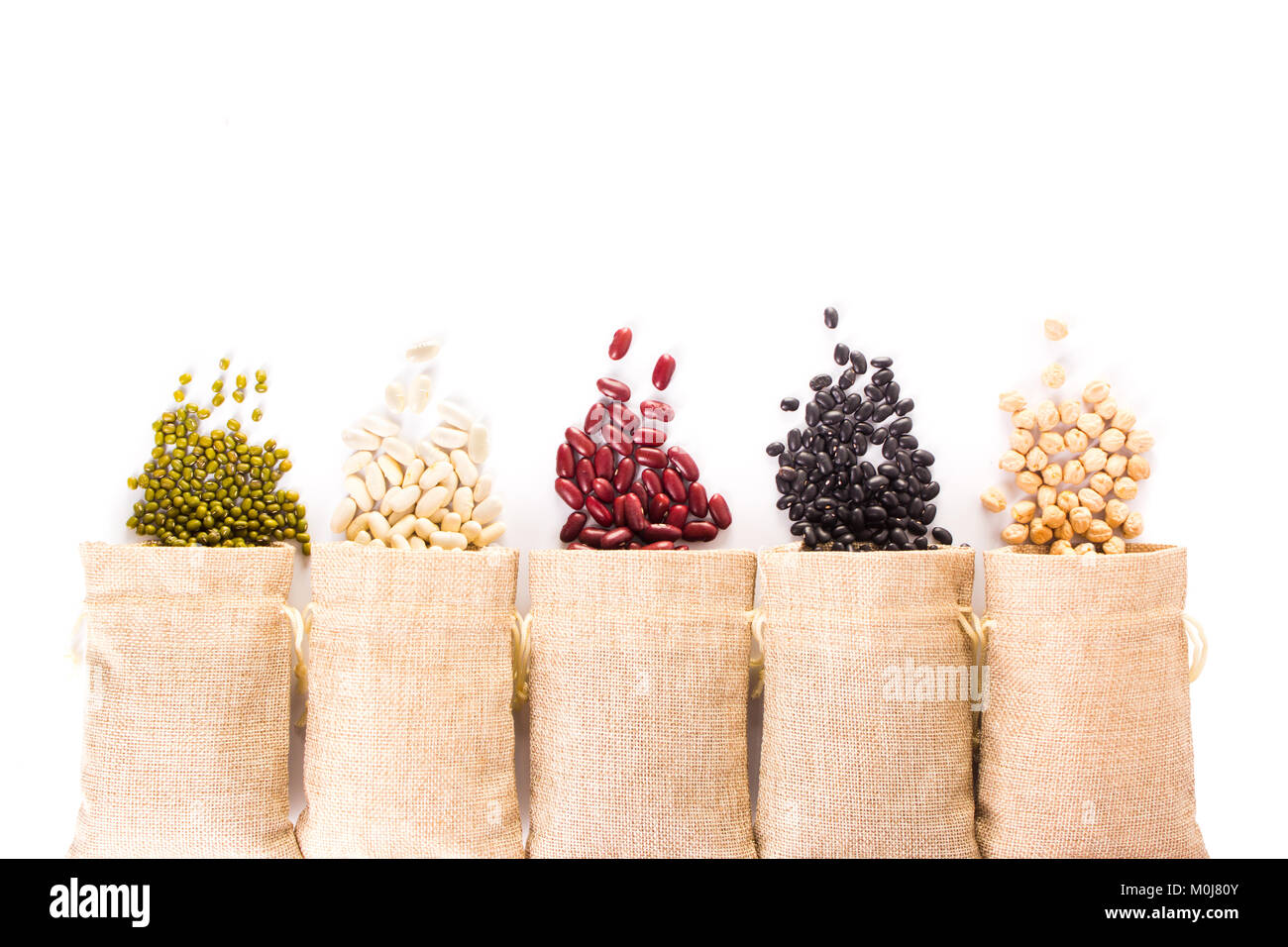 Different types of grains on white background Stock Photo - Alamy