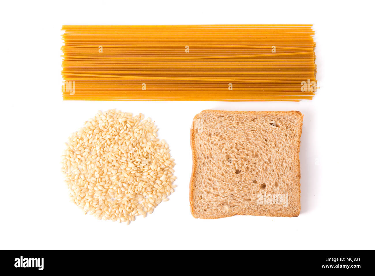 Carbohydrate pasta, rice and wholemeal bread on white background Stock ...