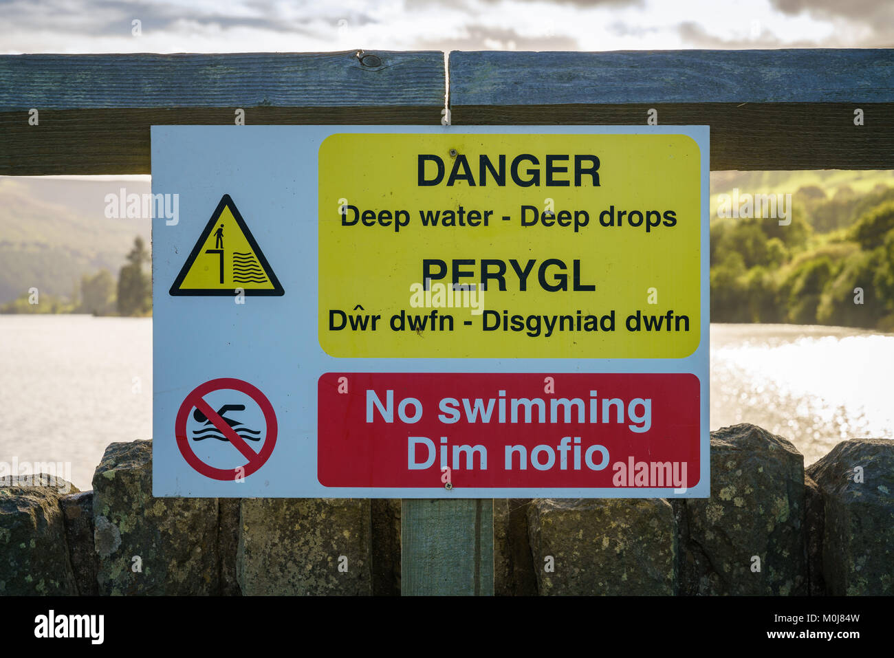 Sign: Danger deep water deep drops no swimming (Welsh & English), seen ...