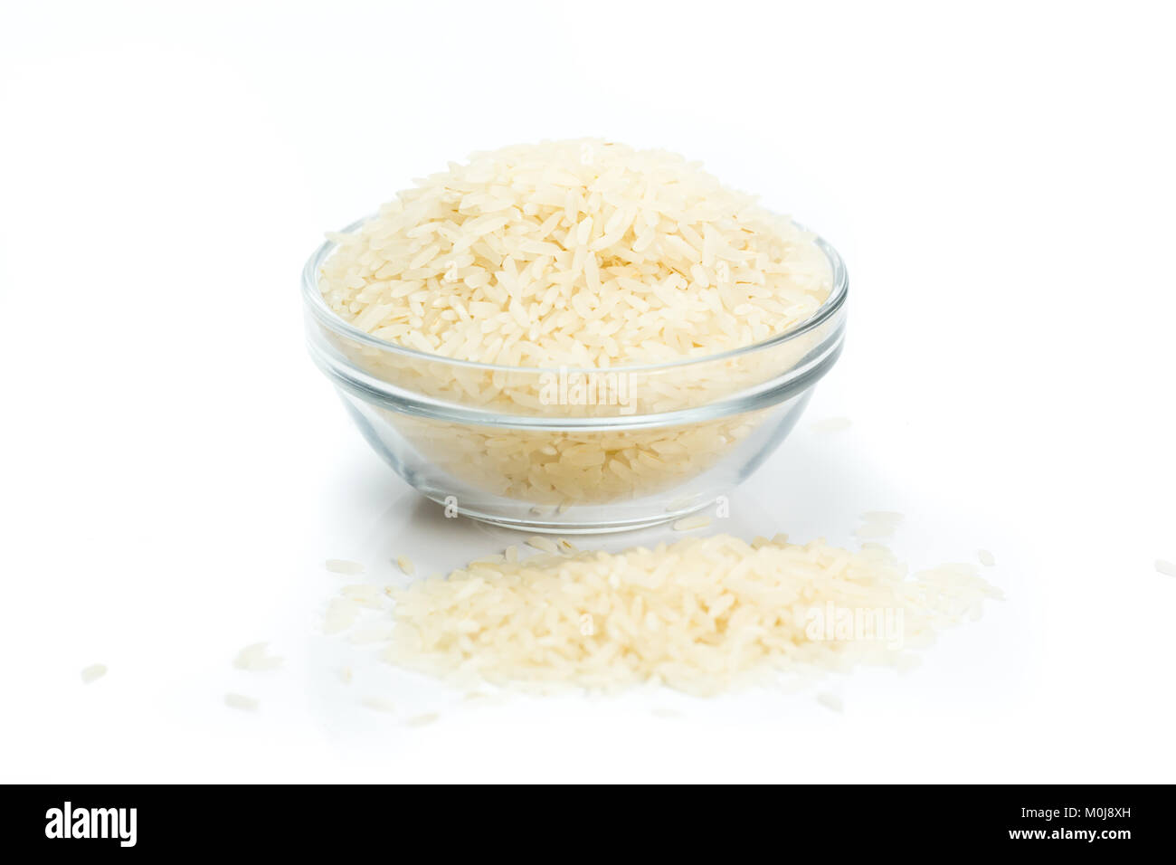 Rice on white background Stock Photo - Alamy