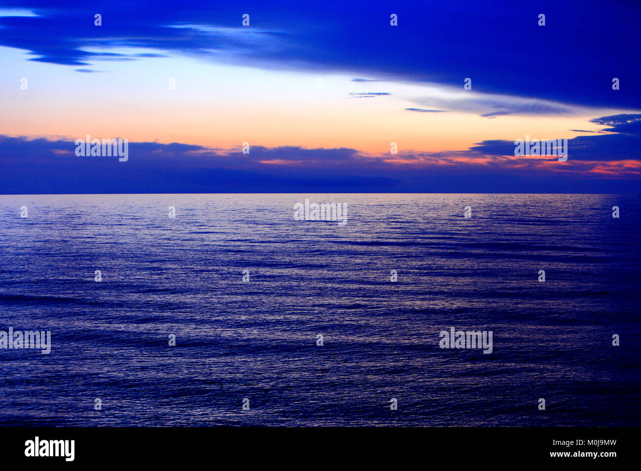 Colorful sunset over the Baltic Sea shore and beach in Rowy, Poland Stock Photo - Alamy
