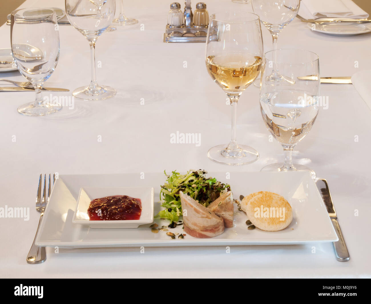 Home made rabbit pate with crispy toast and cranberry sauce Stock Photo ...