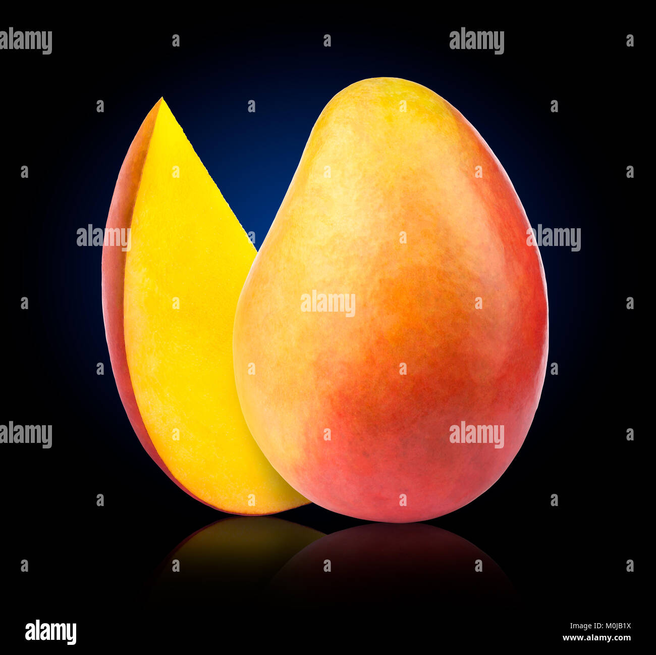 Mango with slice isolated Stock Photo - Alamy