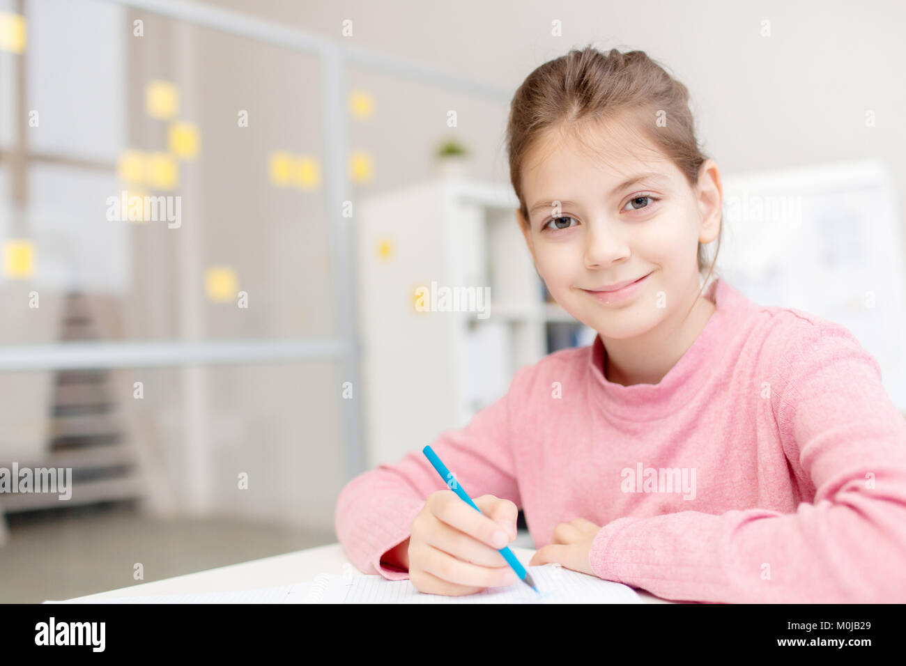 Child at lesson Stock Photo - Alamy