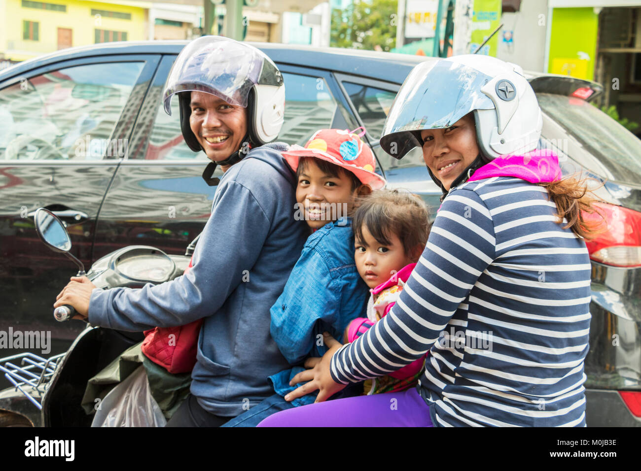 Family riding motorcycle hi-res stock photography and images - Alamy