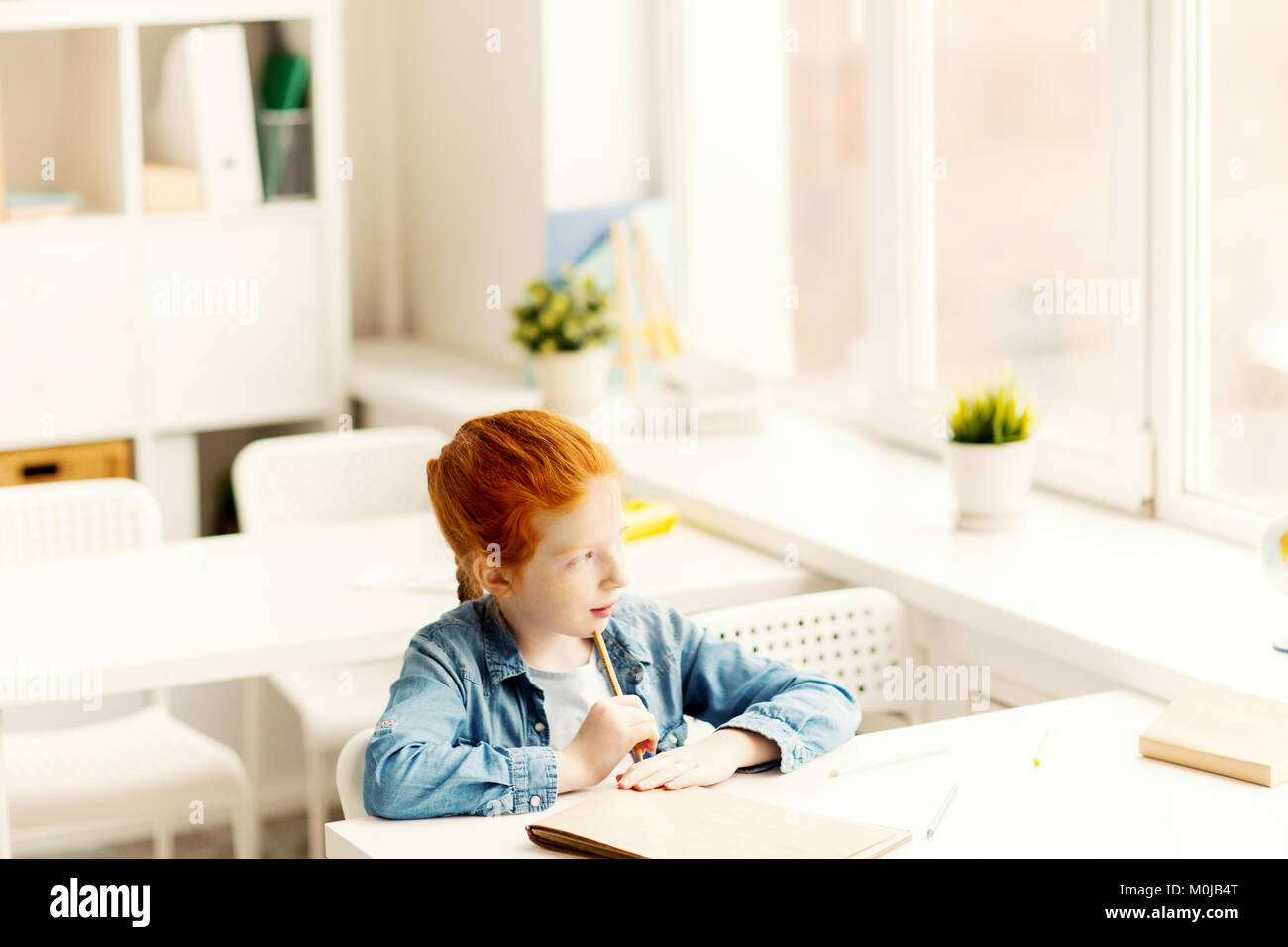 Child contemplating hi-res stock photography and images - Alamy