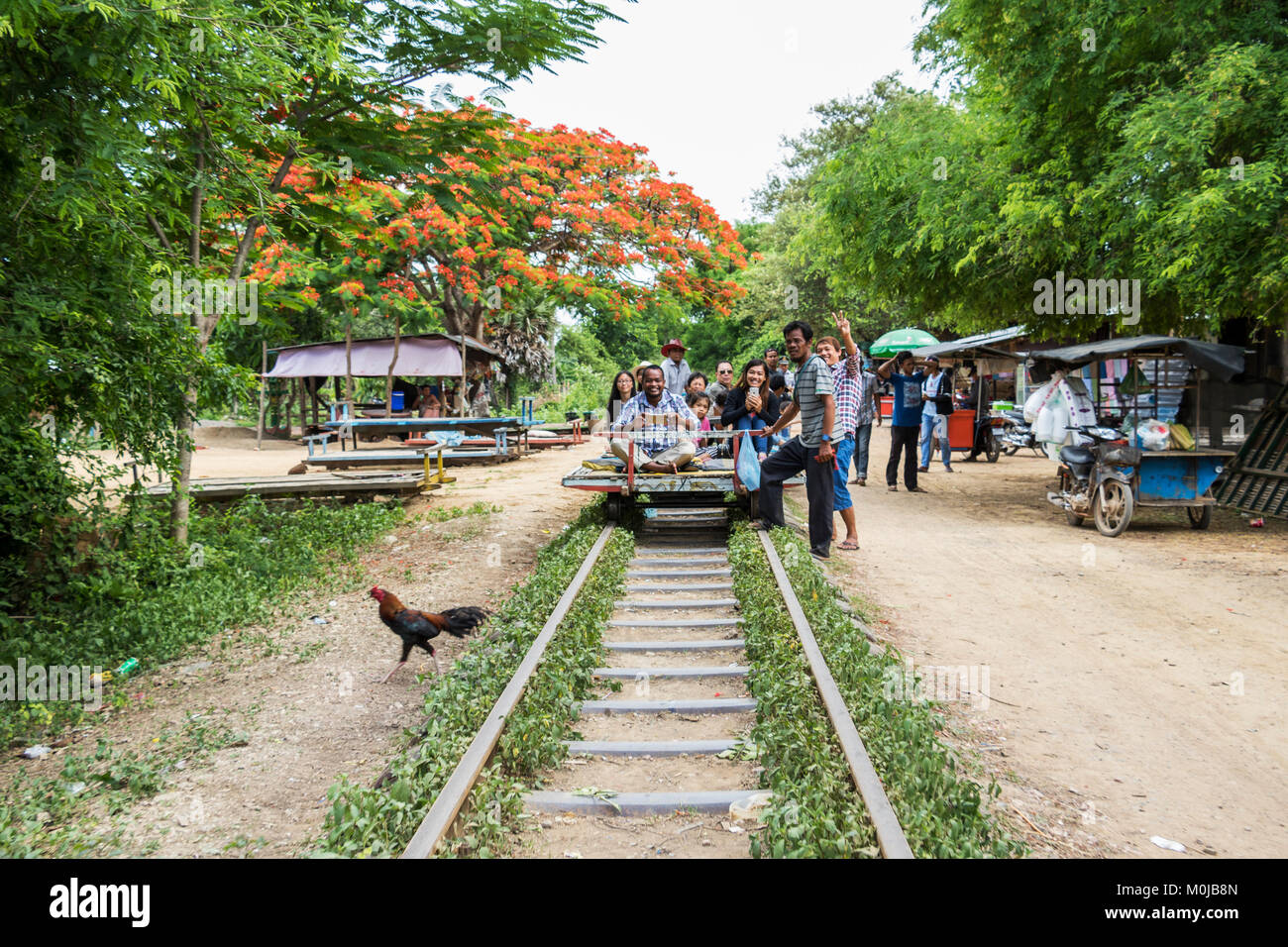 People sitting on a Norry, the bamboo train, at the Norry Railway ...