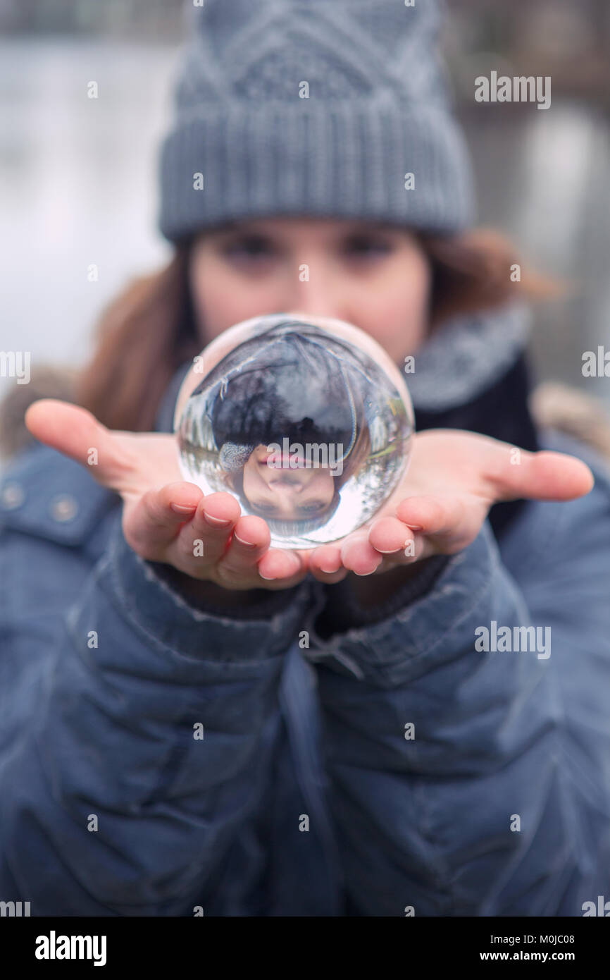 Glass sphere woman hi-res stock photography and images - Alamy