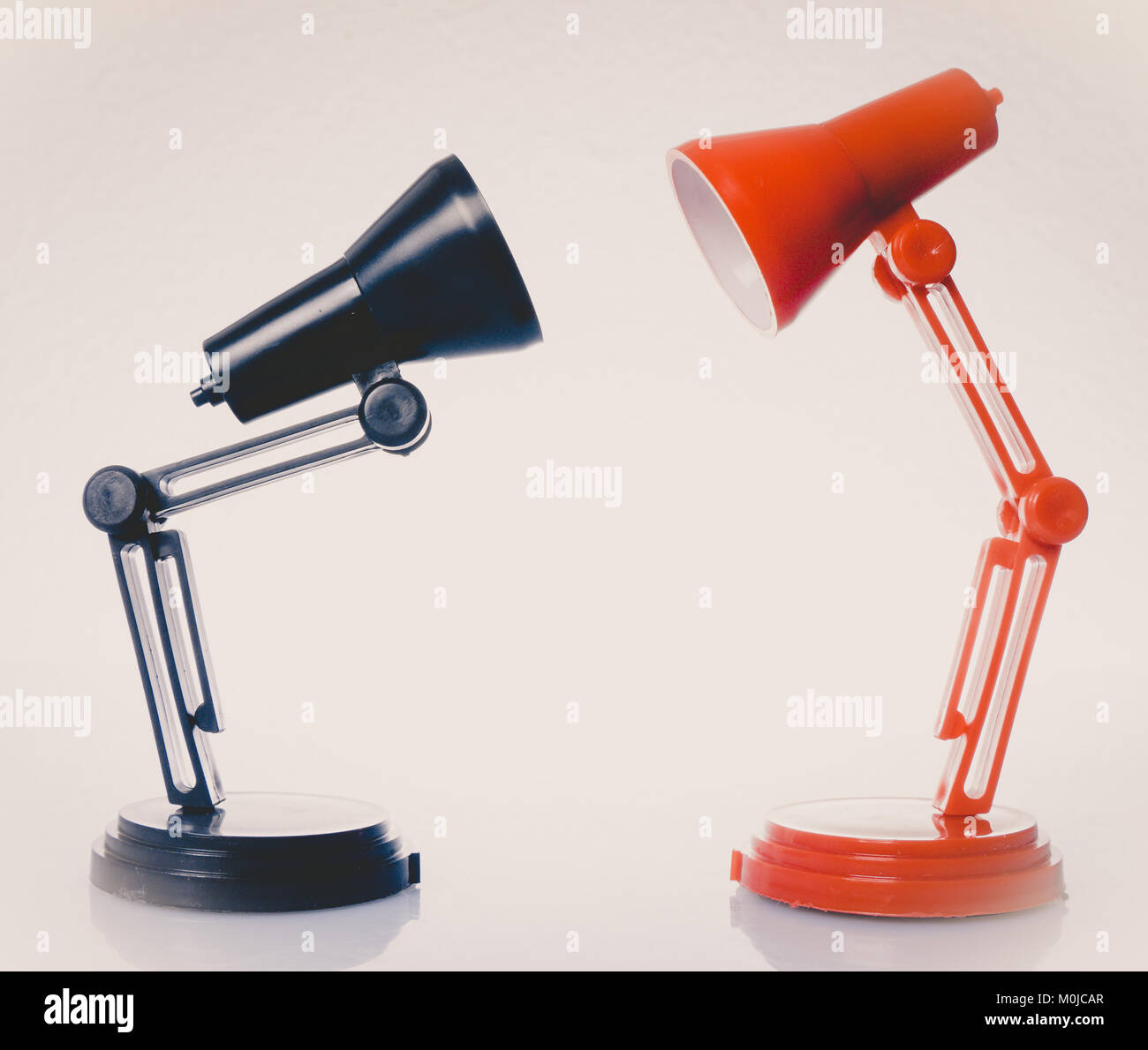 Two table lamps. Vintage red desk lamp Stock Photo - Alamy