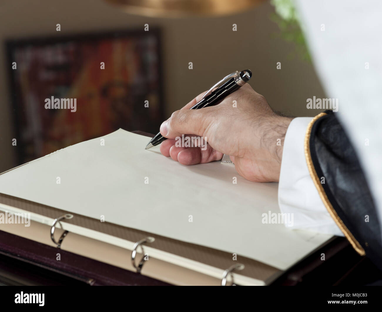 Saudi Arabian Man Hand Writing on A Notebook in a Luxury Home ...