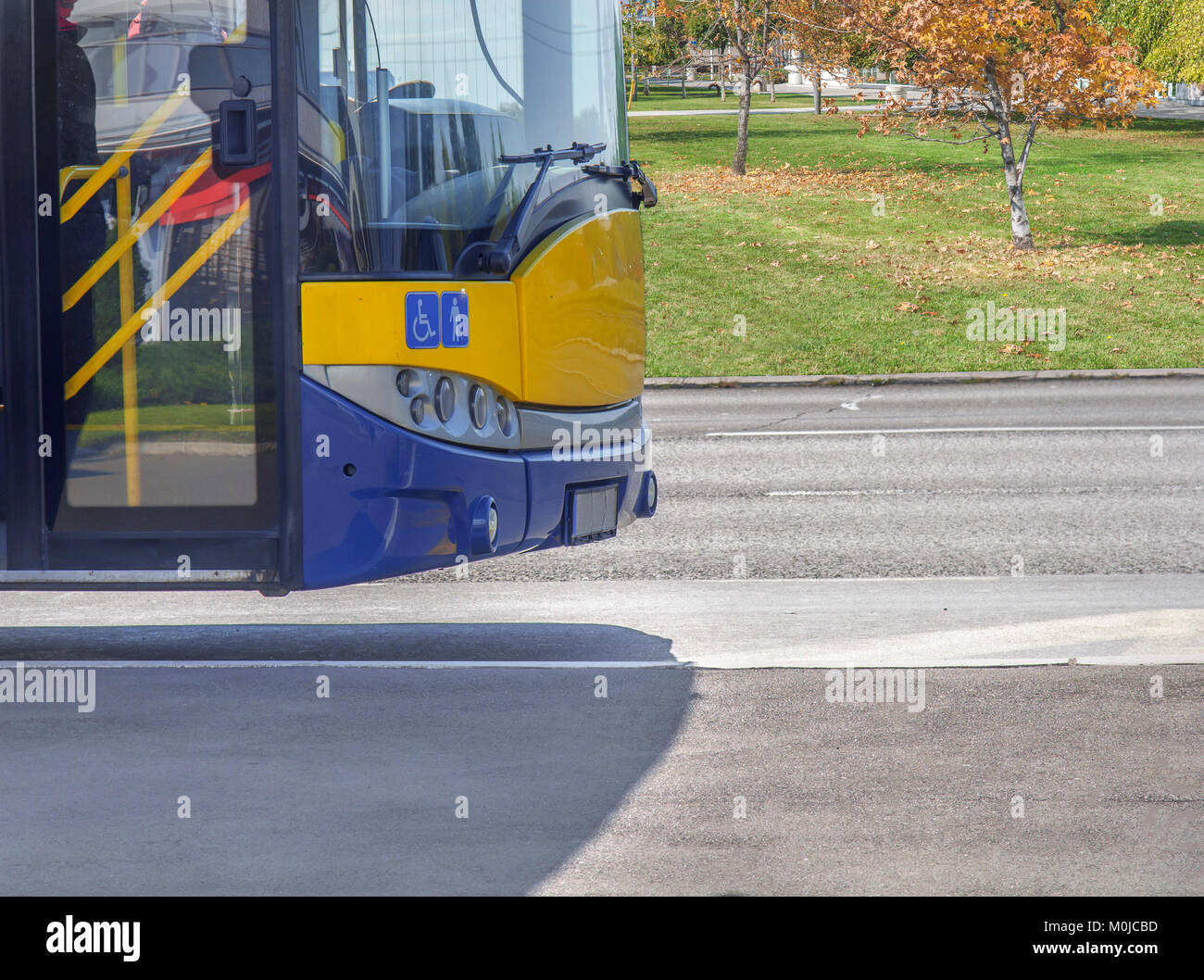 Bus front part on bus stop in the city ready to take passengers Stock ...