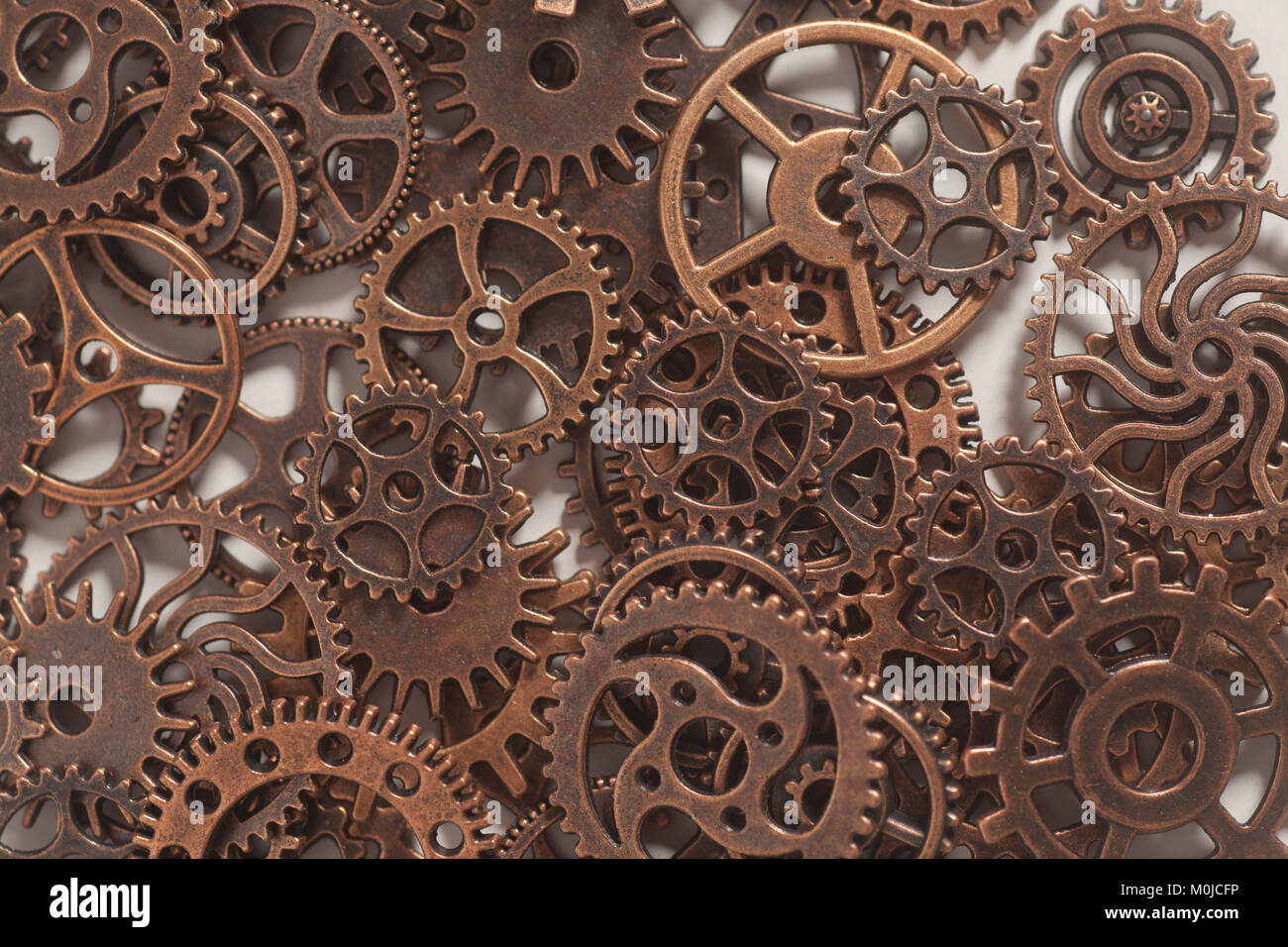 Metal gears wheels cog background close up Stock Photo - Alamy