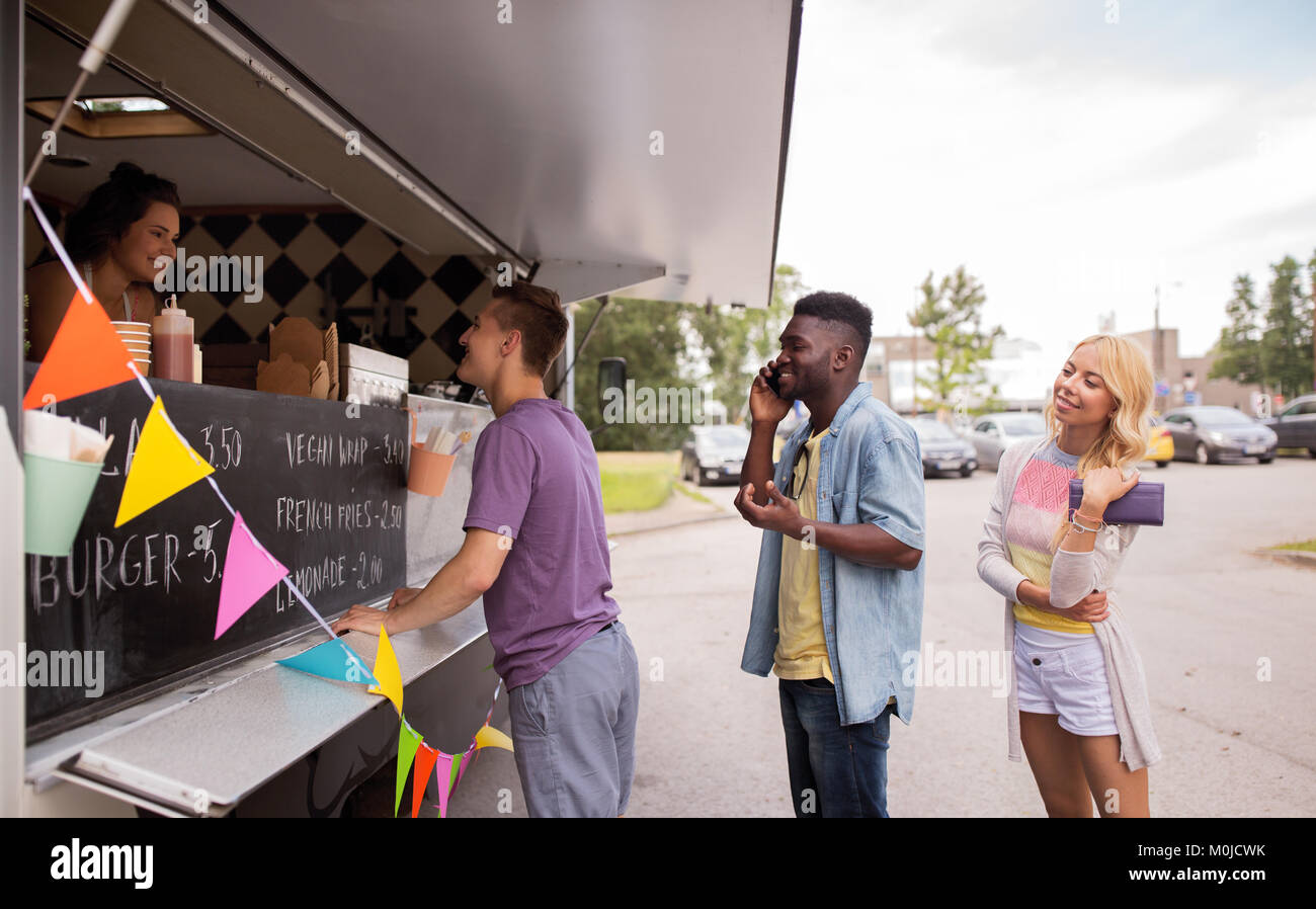 happy customers queue at food truck Stock Photo - Alamy