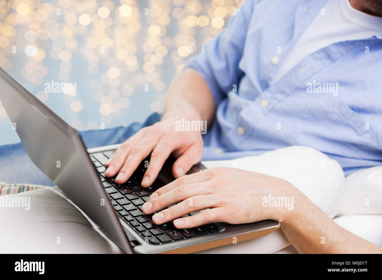 close up of man typing on laptop keyboard Stock Photo - Alamy