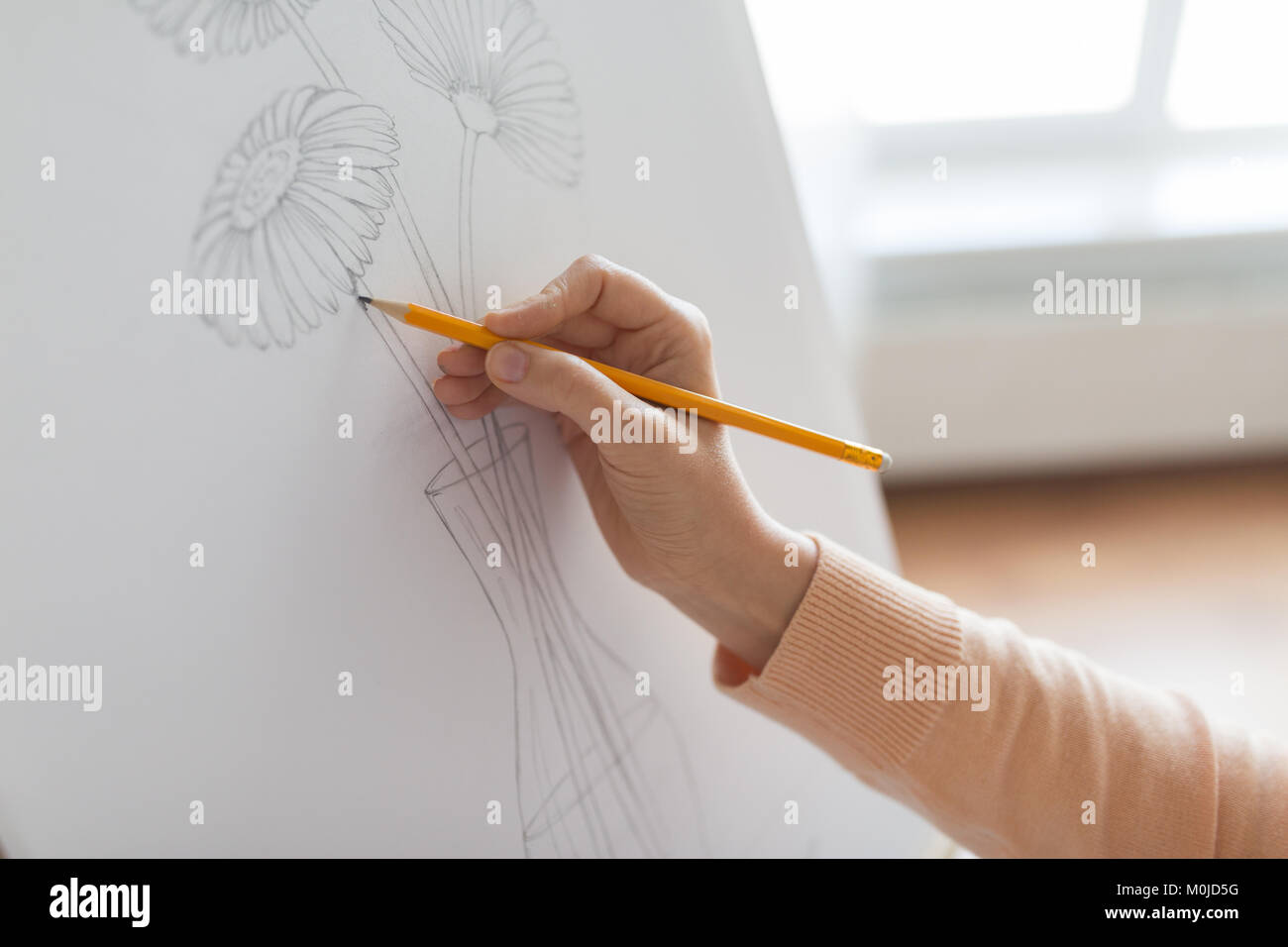 artist with pencil drawing picture at art studio Stock Photo - Alamy
