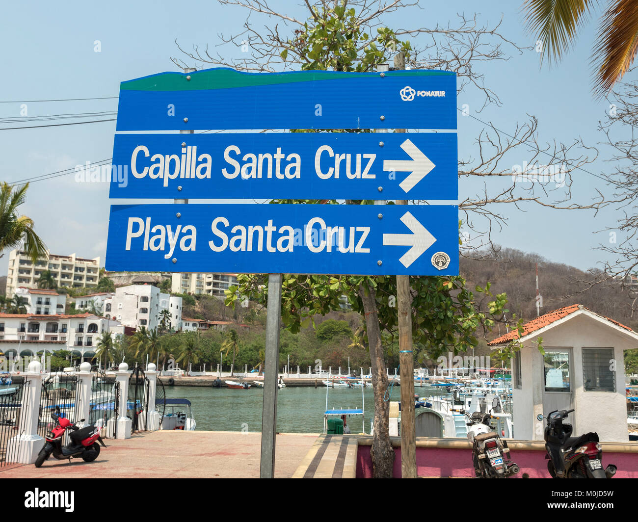 Direction Road Signs In Santa Cruze To The Beach And Santa Cruz Chapel ...
