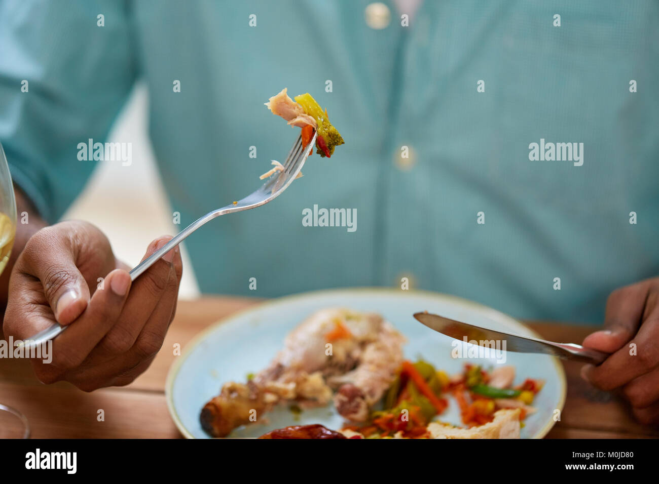 Black people eating meat hi-res stock photography and images - Alamy