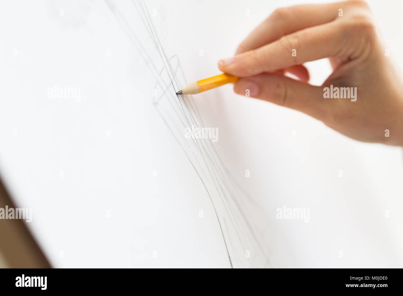artist with pencil drawing picture at art studio Stock Photo - Alamy