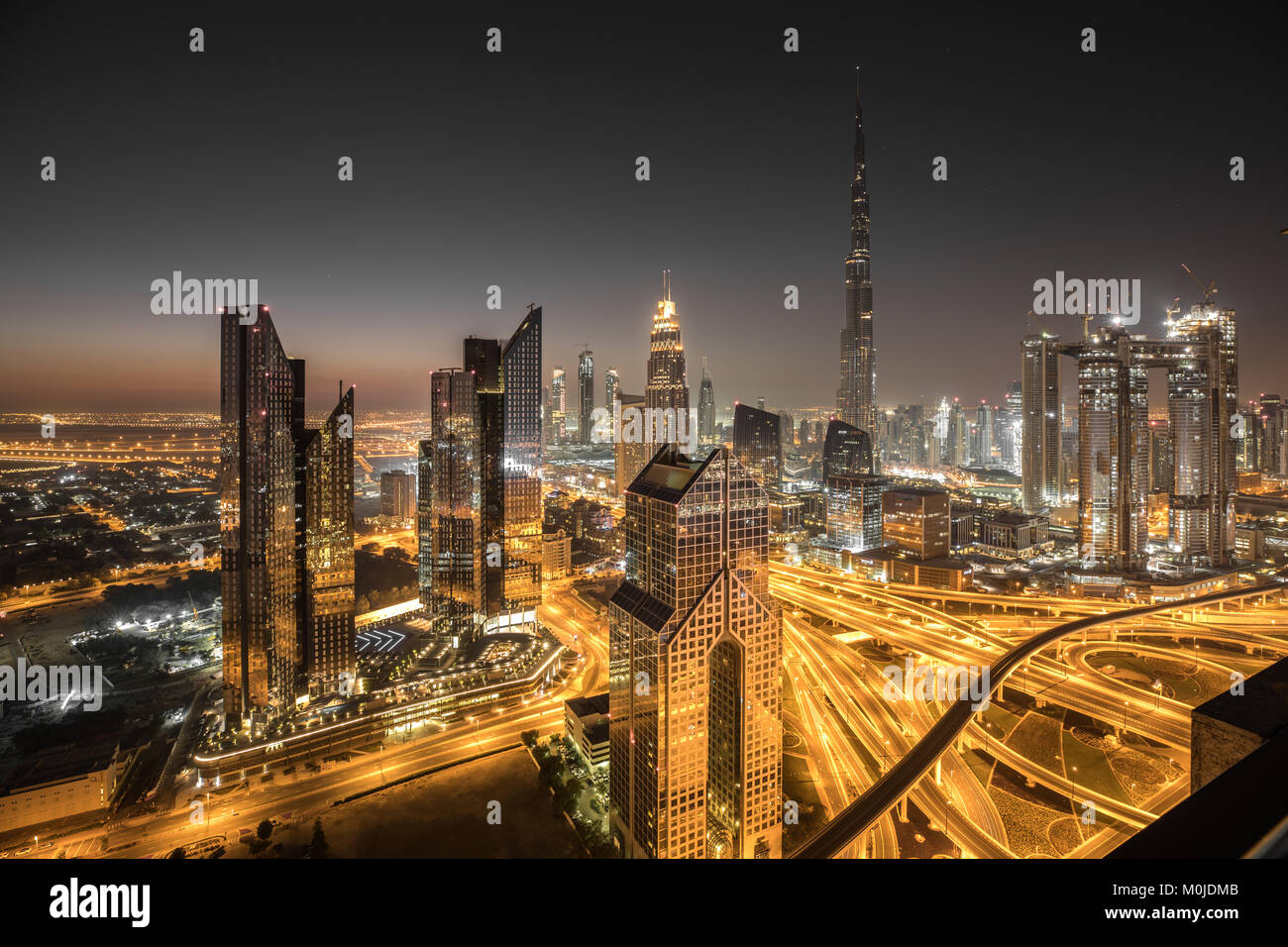 Night time rooftop view of Dubai Downtown district. Dubai, UAE Stock ...