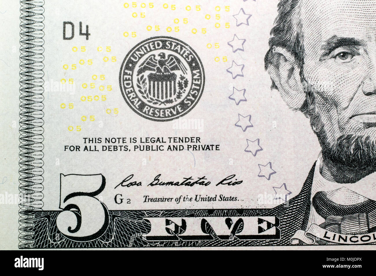 Closeup of a five dollar bill Stock Photo - Alamy