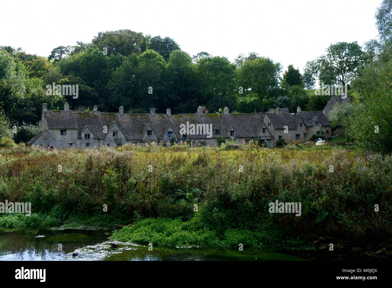 Rack Isle Meadow leading back to Arlington Row in Bibury Stock Photo ...