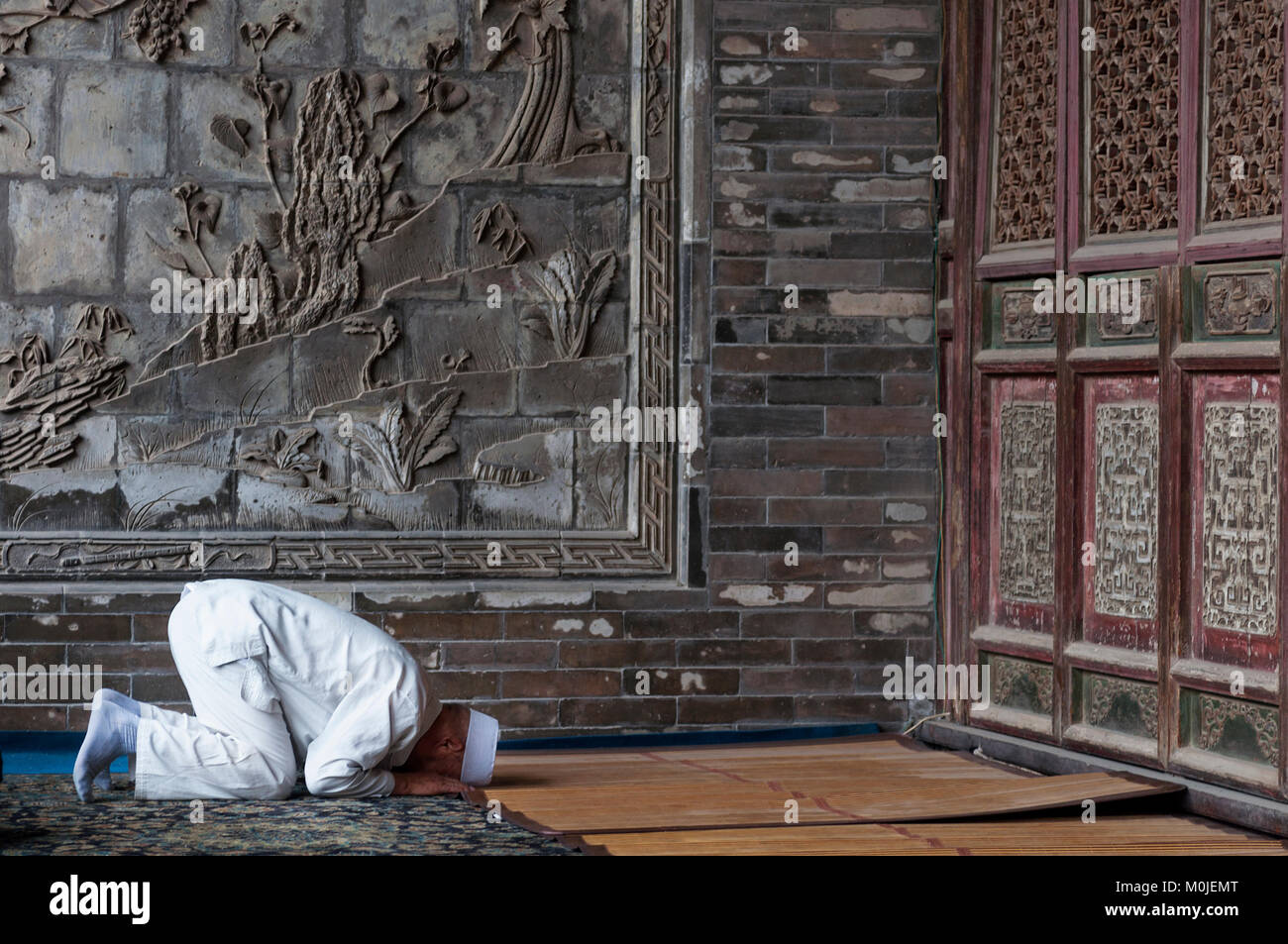 Muslim praying china hi-res stock photography and images - Alamy