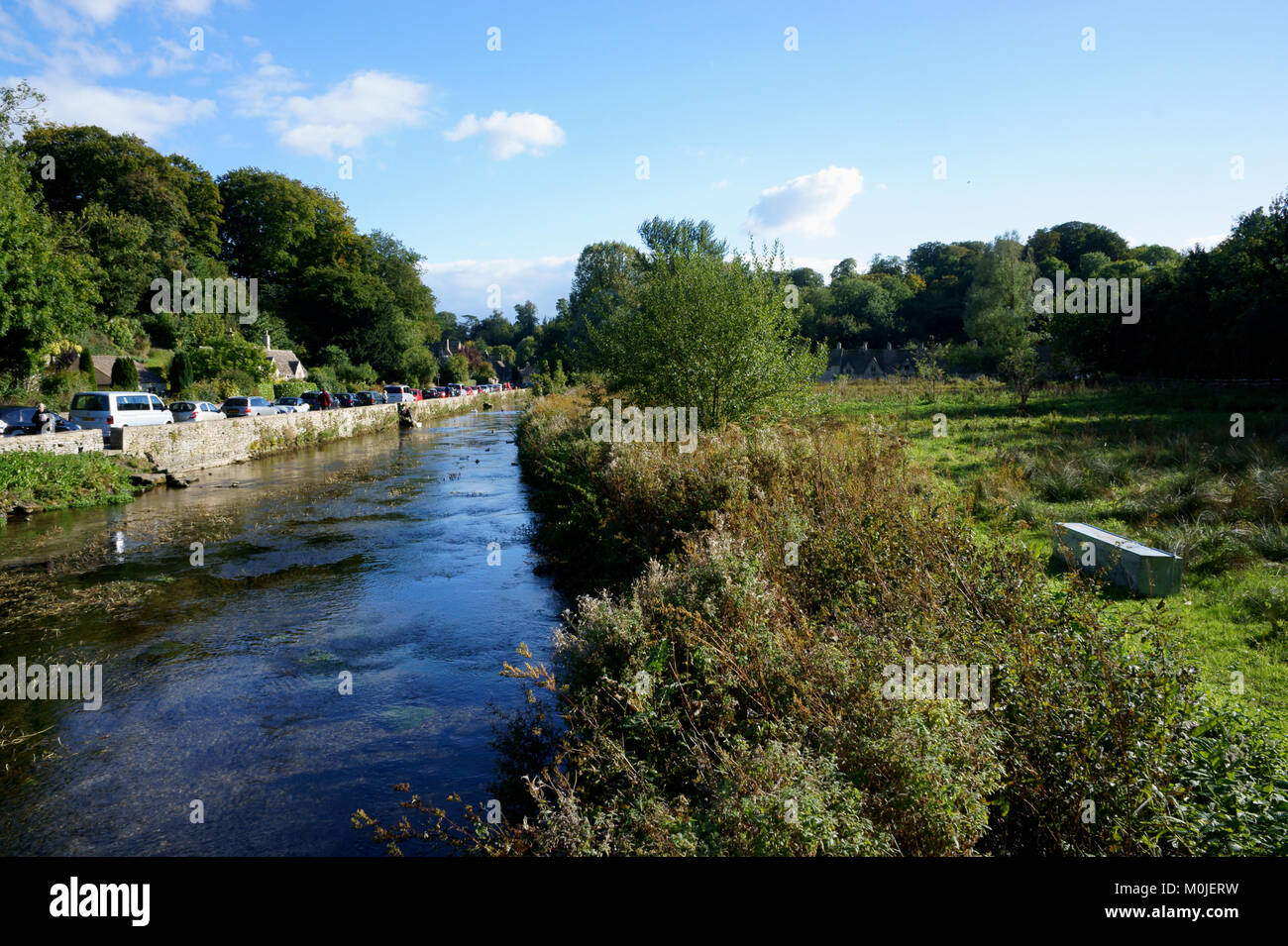 River Coln running through Bibury next to Rack Isle Meadow Stock Photo ...
