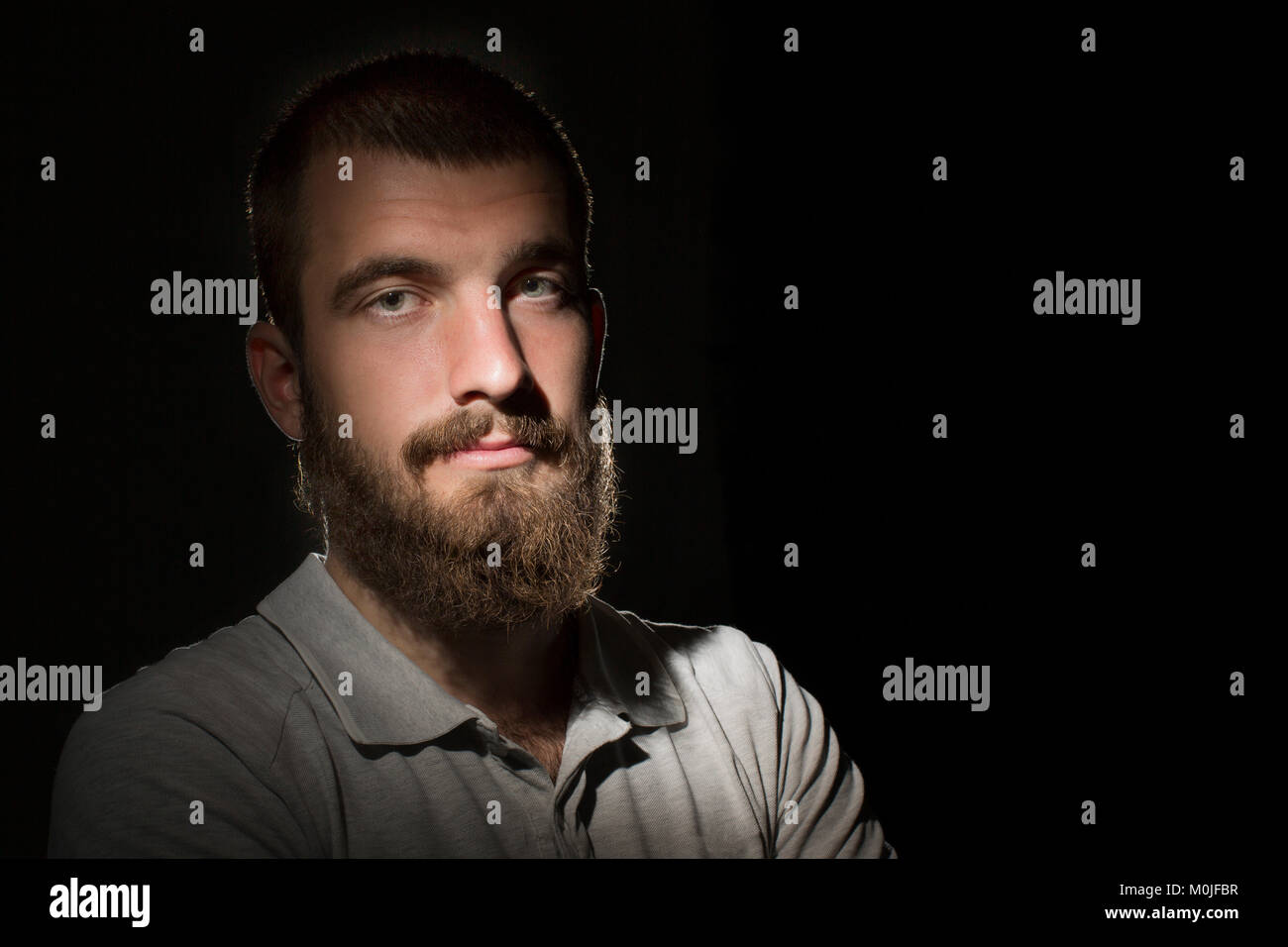 Serious black model background hi-res stock photography and images - Alamy