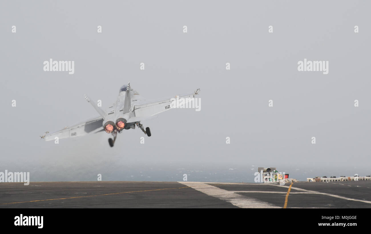 An F/A-18F Super Hornet, assigned to the Fighting Redcocks of Strike ...