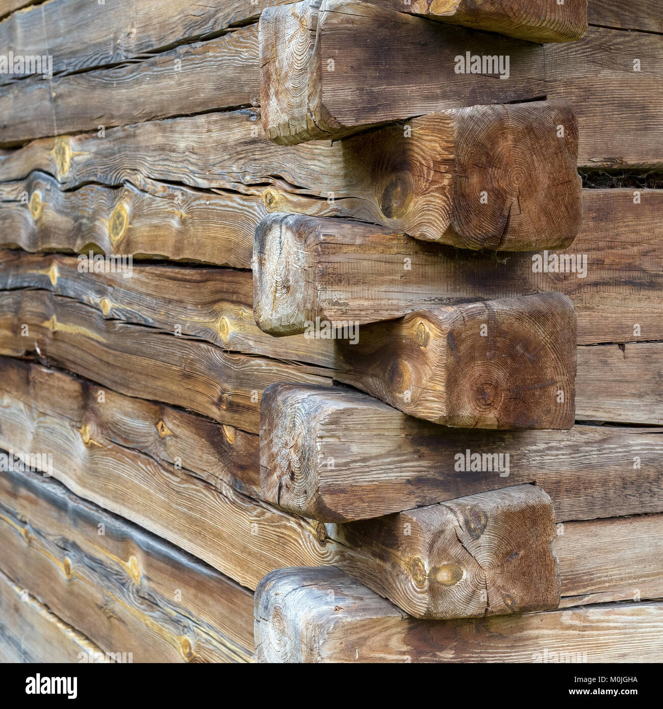 Wood corner of a old building with dovetail joints Stock Photo - Alamy