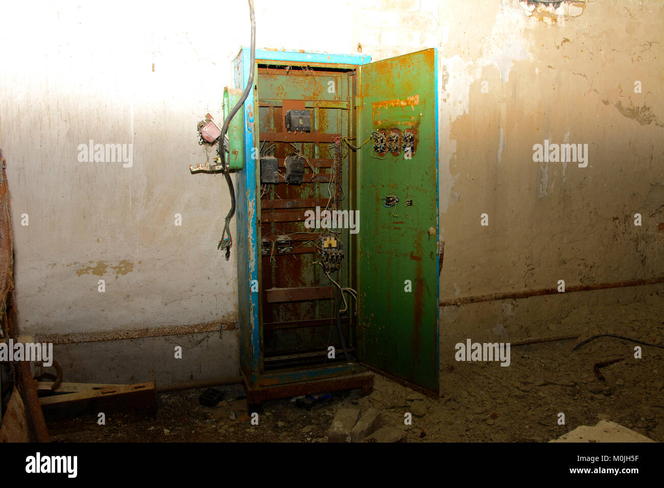 Old power distribution board. Premises of a destroyed and plundered ...
