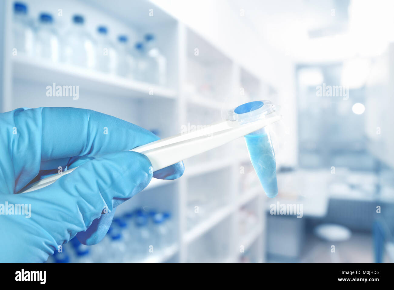 Hand glove laboratory sample hi-res stock photography and images - Alamy