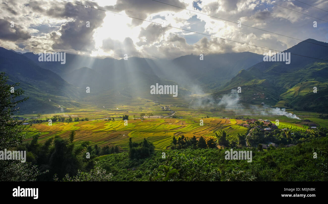 Hmong village with terraced rice field under sun light in Tu Le ...